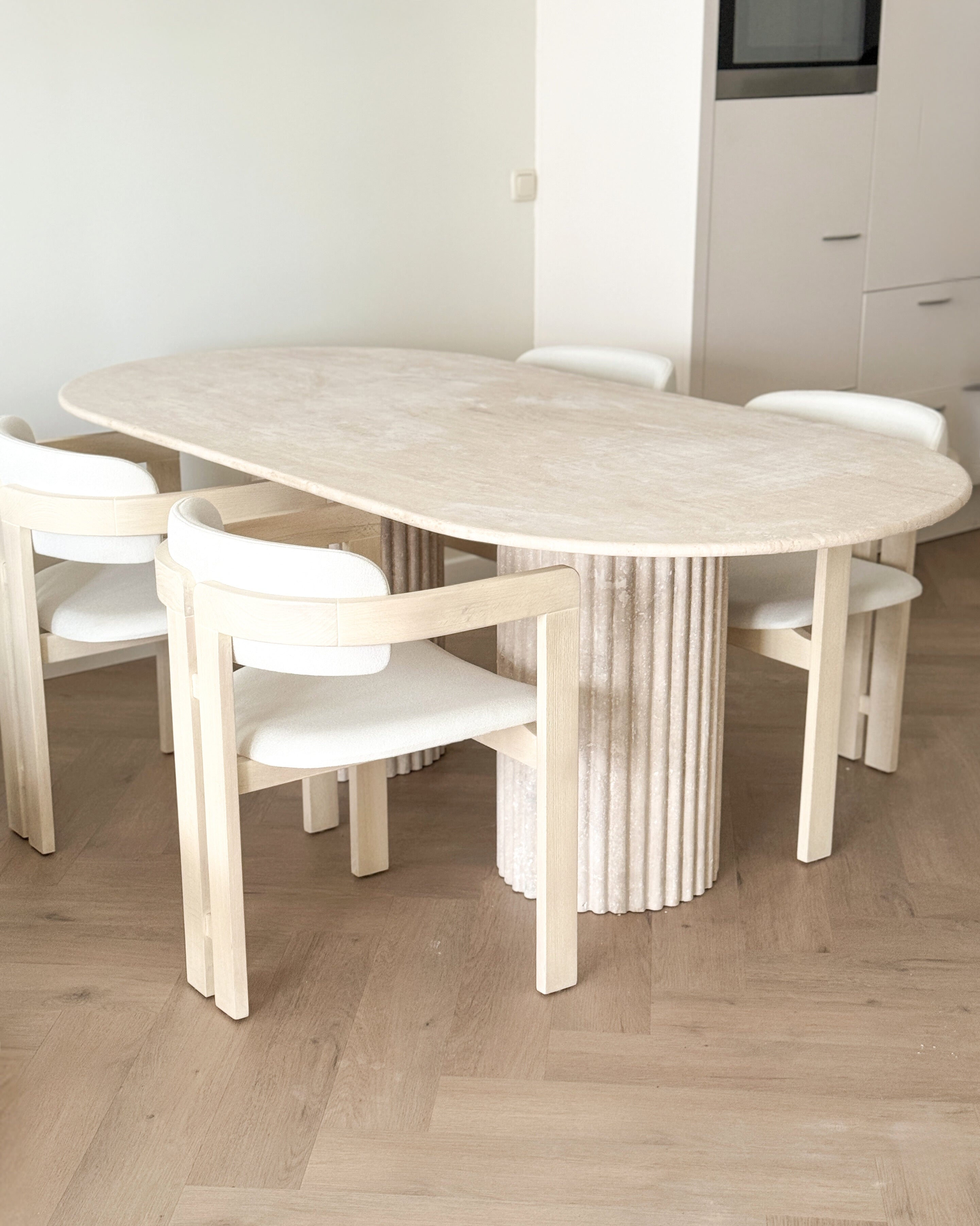 Oval Travertine Dining Table Fluted Legs